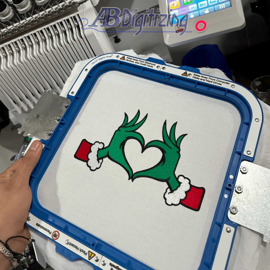 Lovely Grinch Heart Embroidery Design | ABDigitizing